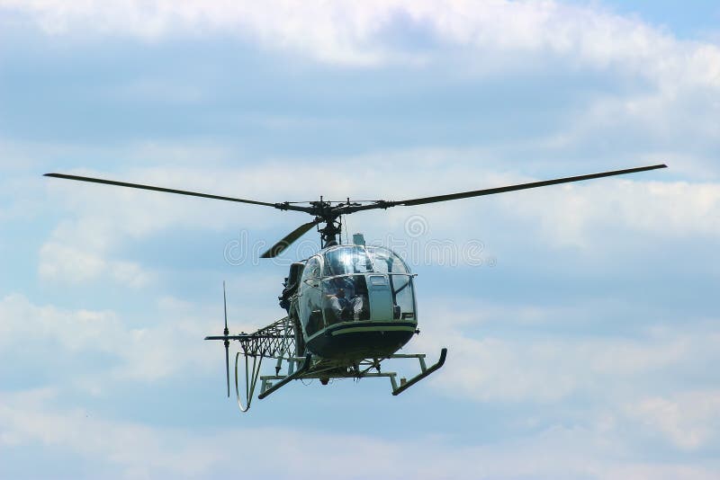 Helicopter fly at the sky stock image. Image of slow - 97403783