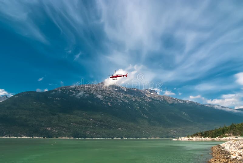 Helicopter Flying Out from Alaska Stock Image - Image of copter, pine ...
