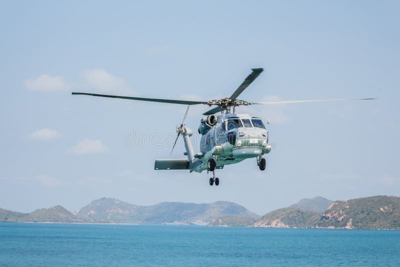 Helicopter Flying Over the Sea Stock Photo - Image of river, airplane ...