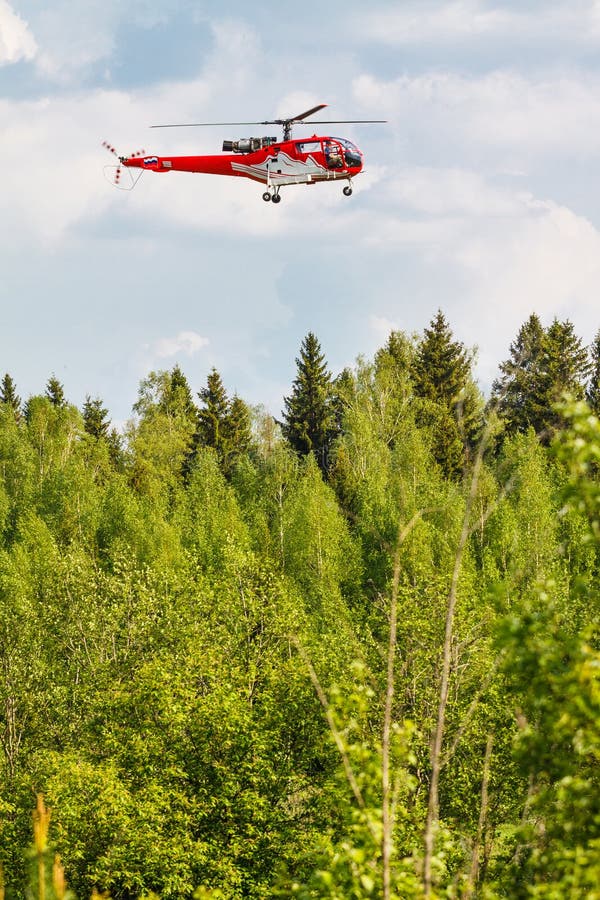 Helicopter in forest stock photo. Image of helipad, field - 27963632