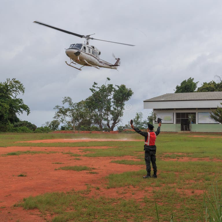 Helicopter on ground editorial photo. Image of propeller - 75741426