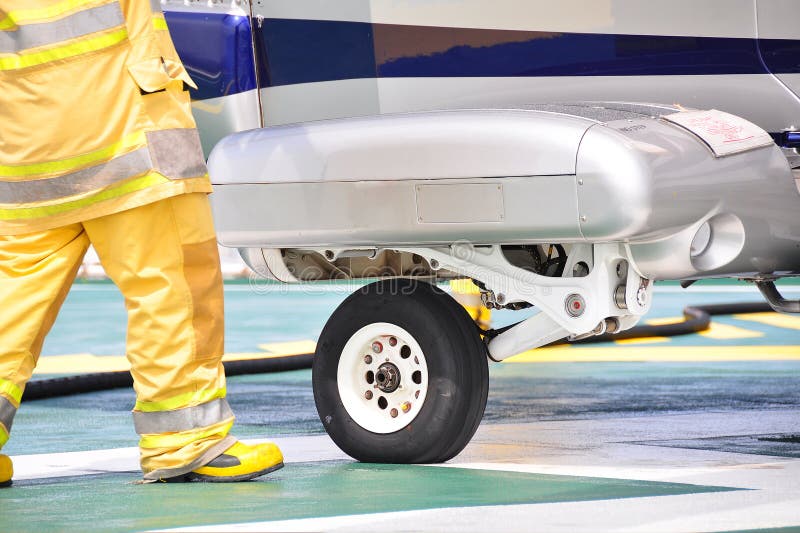 Helicopter Landing Officer Communicating with Pilot and Copilot for ...