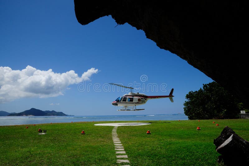 Helicopter Landing on a Tropical Island Editorial Photo - Image of ...