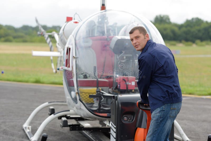 Helicopter Male Worker Looking at Camera Stock Photo - Image of outside ...