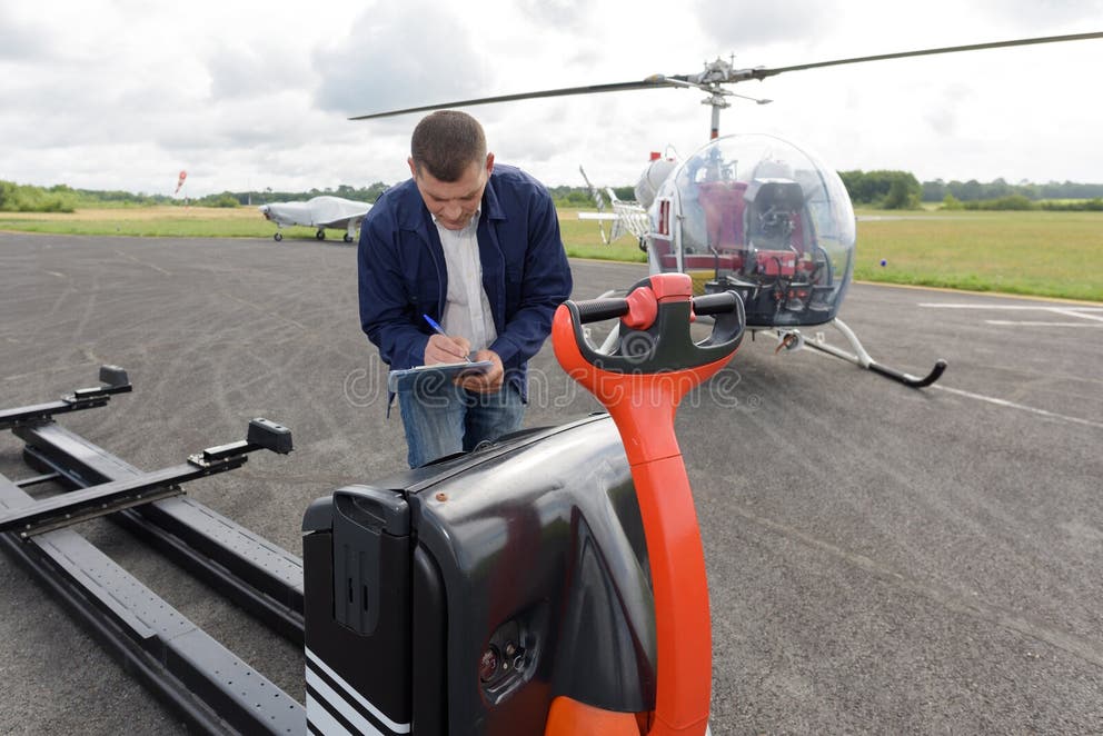 Helicopter Mechanic Controlling Helicopter Stock Image - Image of ...
