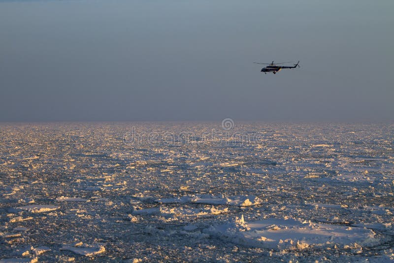 Helicopter over the Arctic editorial stock photo. Image of expedition ...