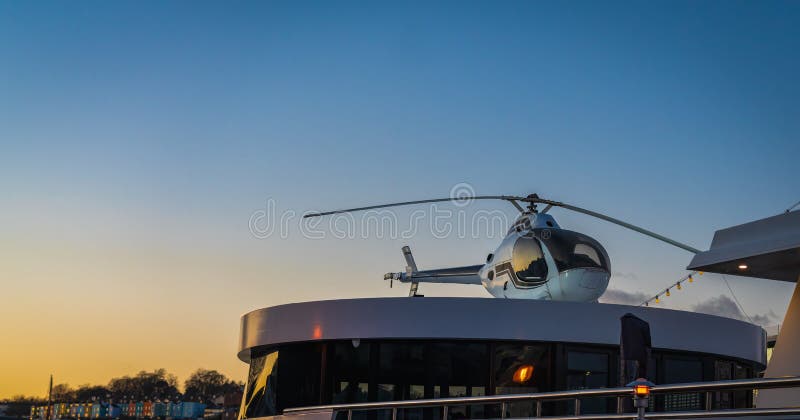 Helicopter Over a Boat in Bristol England Stock Photo - Image of boat ...