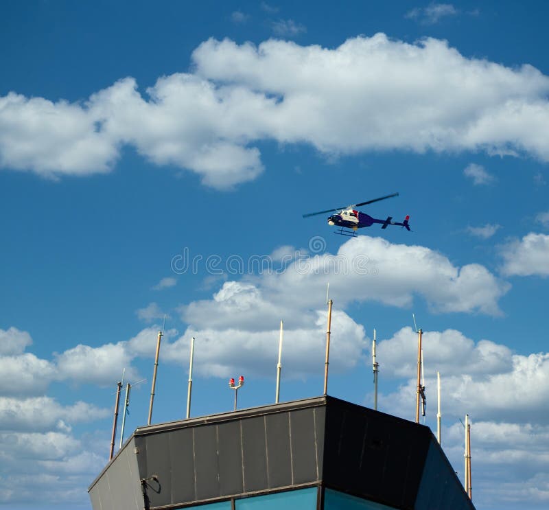 Helicopter Over Control Tower Stock Photo - Image of architecture ...