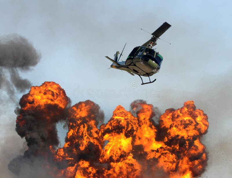 Helicopter over fire stock image. Image of explosive - 11642875