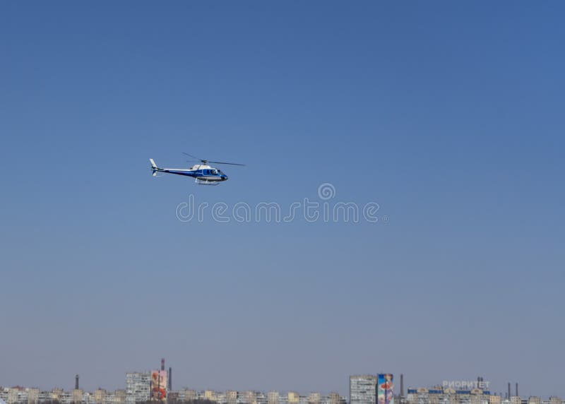 Helicopter Over the River in Cold, Sunny Weather. Stock Photo - Image ...