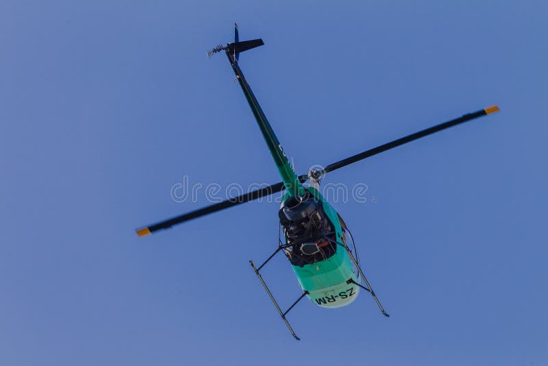 Helicopter Overhead Blue editorial stock image. Image of helicopter ...