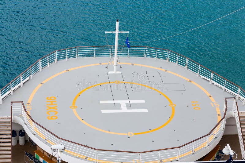 Green Helicopter Pad on Deck of Ship Stock Photo - Image of water, blue ...