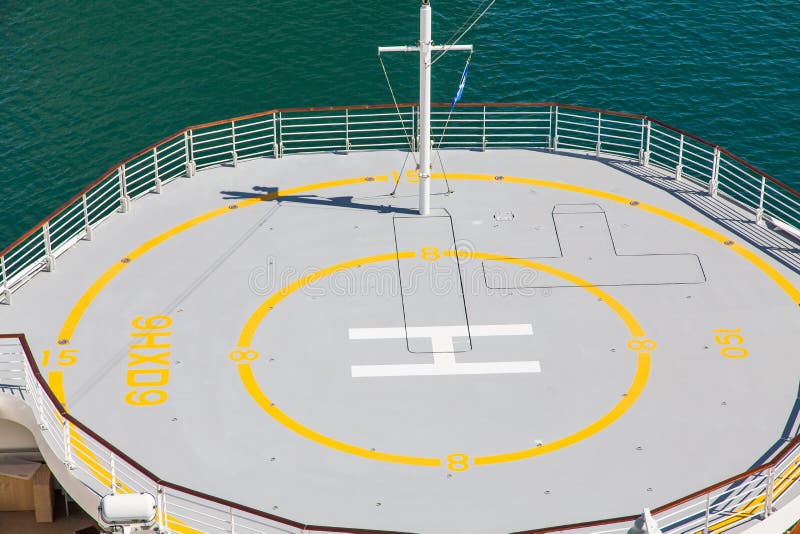 Green Helicopter Pad on Deck of Ship Stock Photo - Image of water, blue ...