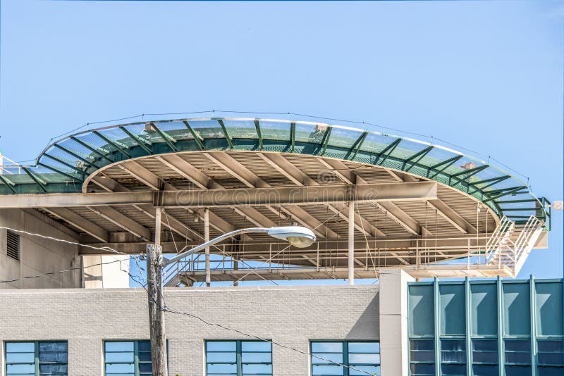 Helicopter Pad on Top of a Building with Blue Skies Stock Image - Image ...