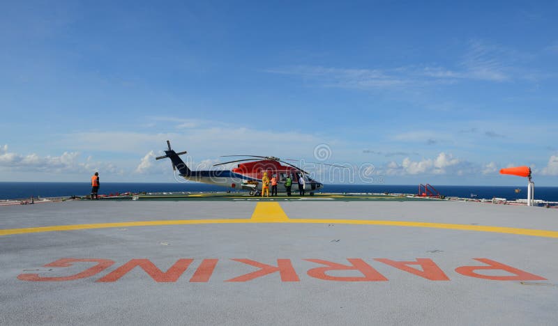 Helicopter park on oil rig stock image. Image of field - 27828801