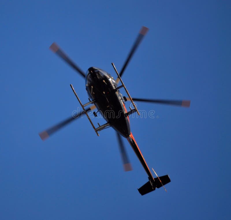Helicopter from below stock photo. Image of hover, horizon - 126319676