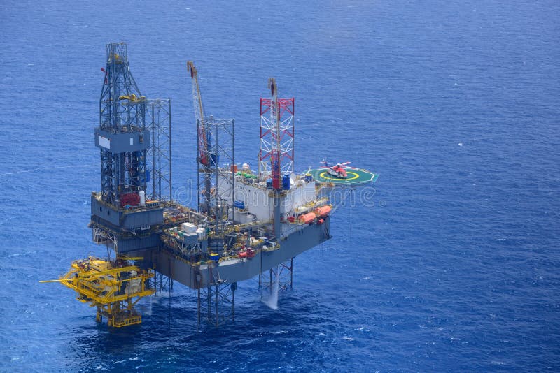 Helicopter Pick Up Passenger on the Offshore Oil Rig. Stock Photo ...