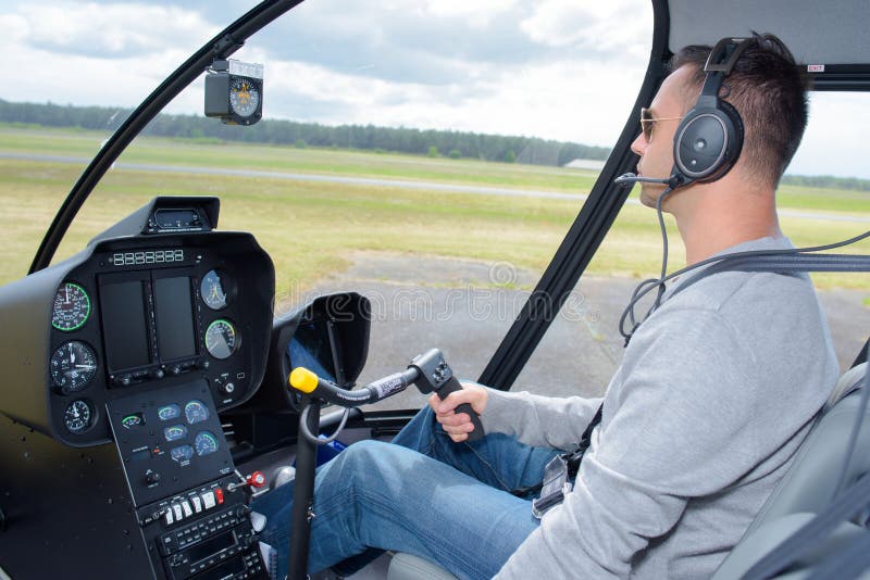 Helicopter pilot flying stock photo. Image of view, control - 323414928
