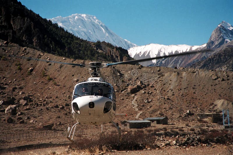 Helicopter in Himalaya editorial image. Image of base - 168165115