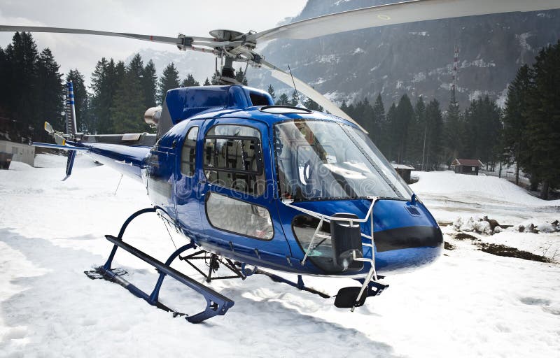 Helicopter Resting on the Snow - Front Stock Photo - Image of ...