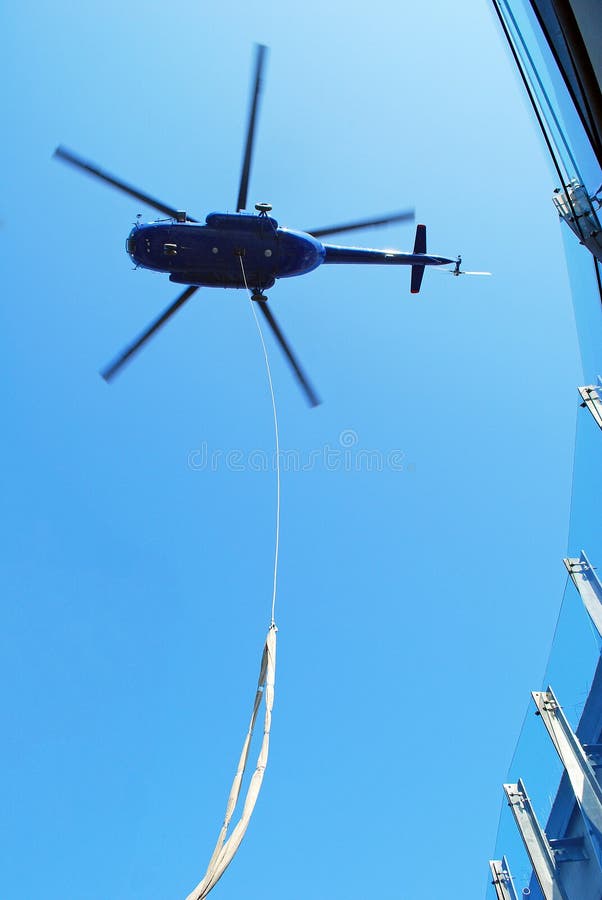 Helicopter with rope stock image. Image of transportation - 28693919