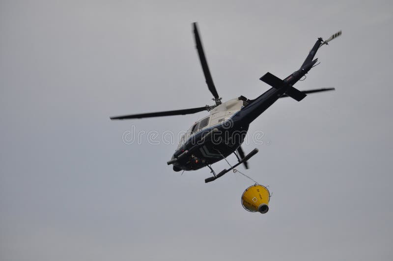 Helicopter Saving People in Flight Stock Image - Image of machine ...