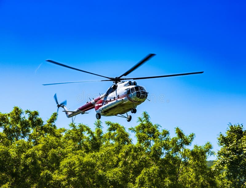 The Helicopter in the Sky at Approach Stock Image - Image of aerial ...