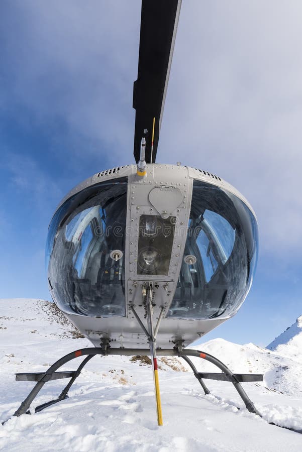 Helicopter on the snow stock image. Image of mountain - 206205157