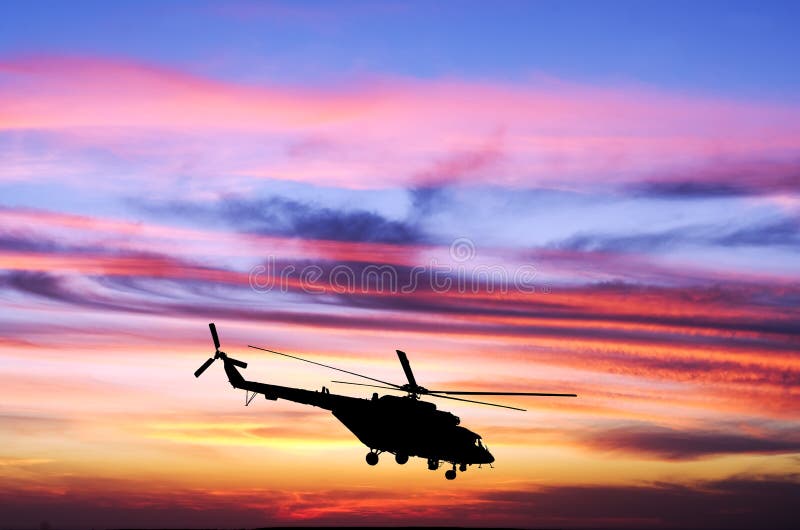 Helicopter at sunset stock image. Image of aviation, machine - 71338619