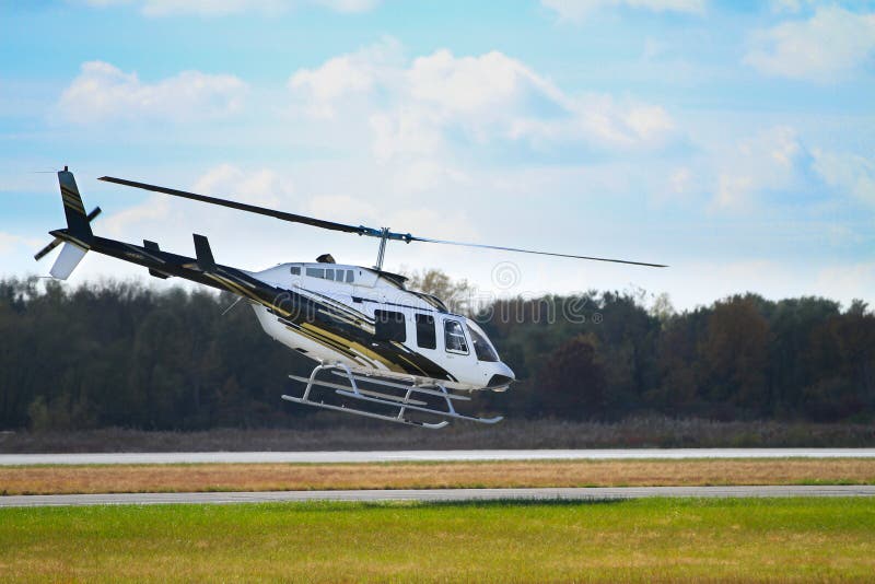 Helicopter take off stock image. Image of detailed, clouds - 27294665
