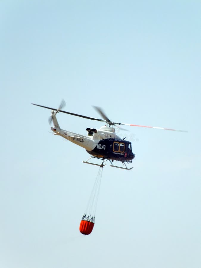 Helicopter with tank editorial photo. Image of reservoir - 255222811