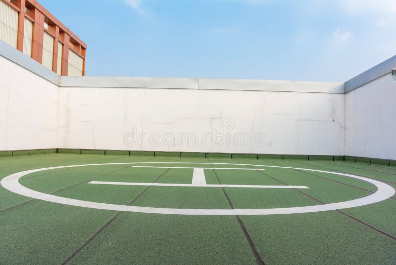 Heliport on tower in wall stock image. Image of transport - 55842509