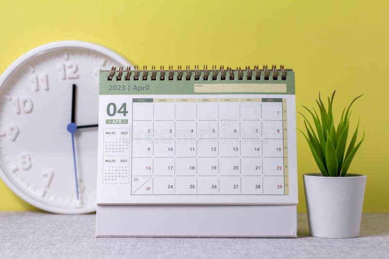Hello April.Desktop Calendar for April 2023 on the Table. Stock Image ...