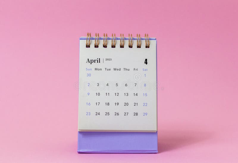 Hello April.Desktop Calendar for April 2023 on the Table. Stock Image ...