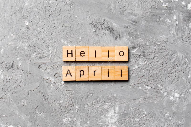 Hello April Word Written On Wood Block. Hello April Text On Table ...