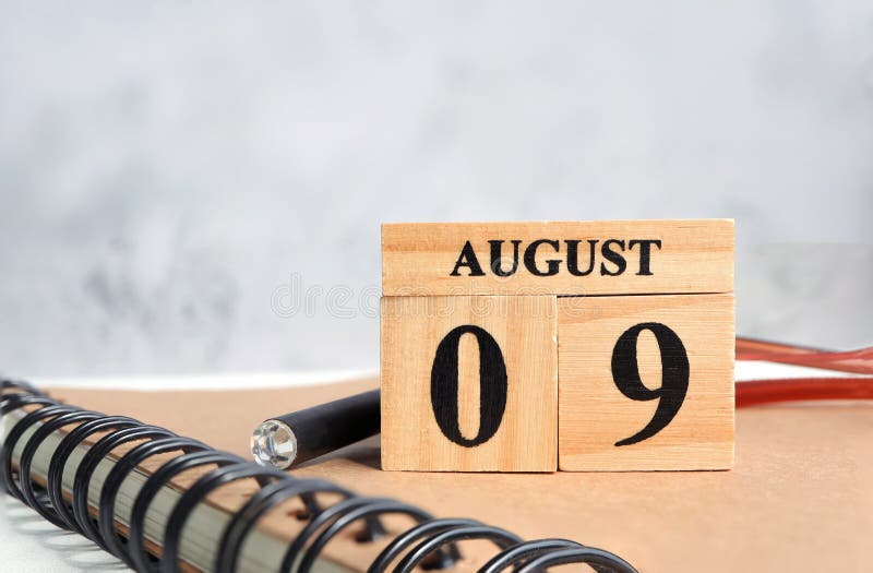 Hello August, Cube Wooden Calendar Showing Date on 9 August. Stock ...