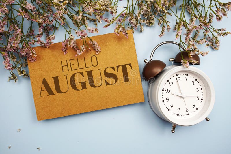 Hello August Written on Paper Card with Flower and Alarm Clock on Blue ...