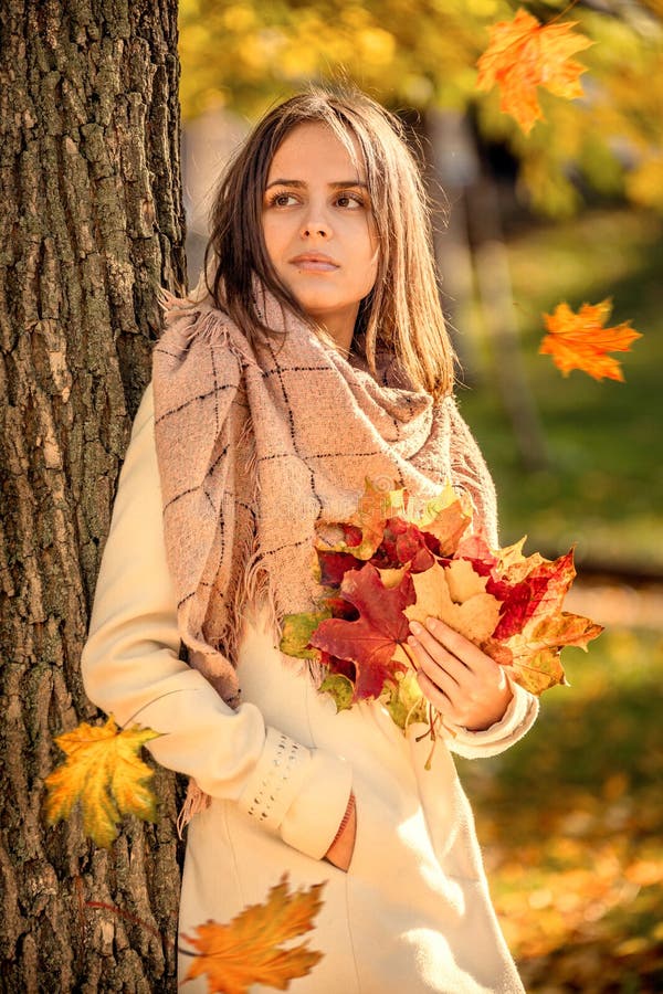 Hello Autumn, Young Woman in Autumn Park with Falling Maple Leaves ...