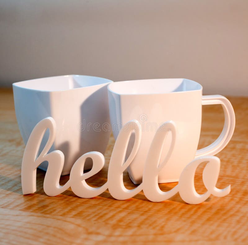 Hello with Coffee Mugs stock photo. Image of wood, plastic - 25730898