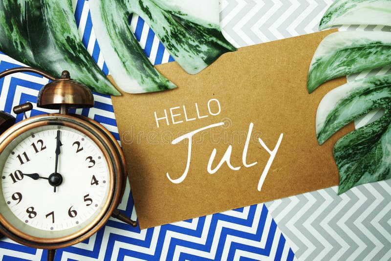 Hello July Typography Text on Paper Card with Alarm Clock and Monstera ...
