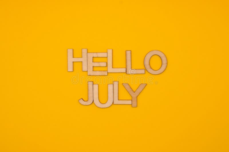 Hello july write stock photo. Image of yellow, hello - 358824240
