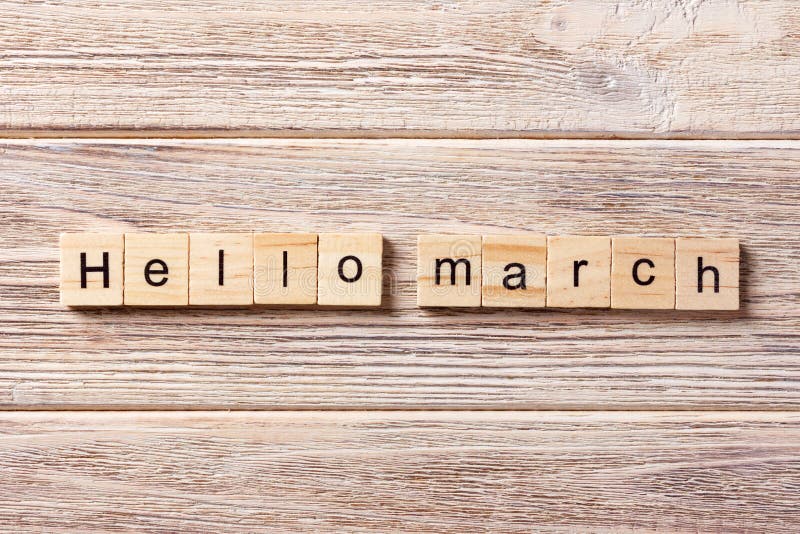 Hello March Word Written On Wood Block. Hello March Text On Table ...