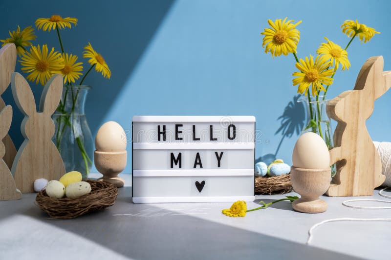 HELLO MAY Text on Lightbox with Bunny Wooden Figures Eggs and Fresh ...