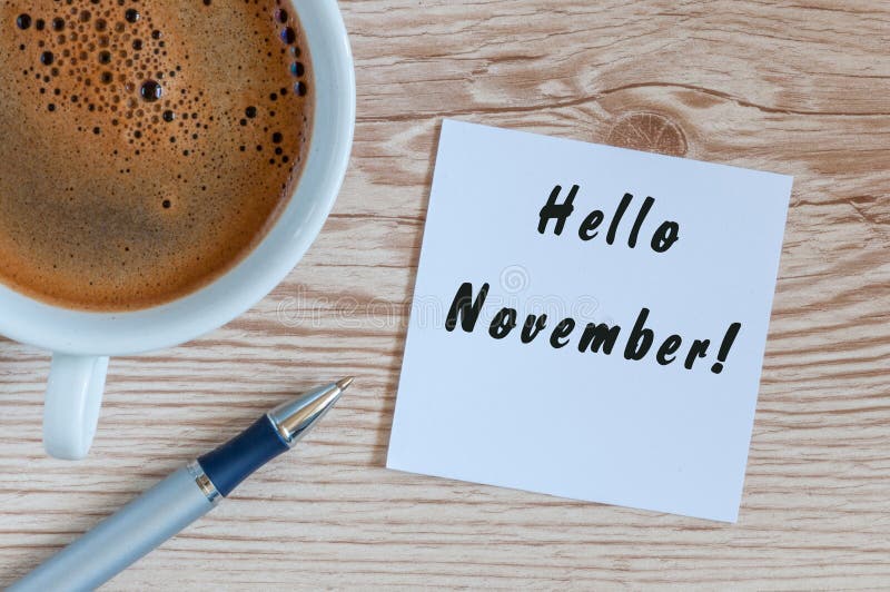 Hello November. Hand Drawn Lettering on Notepad at the Table with ...