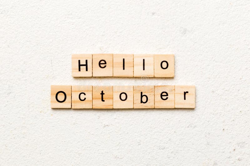 Hello October Word Written on Wood Block. Hello October Text on Table ...