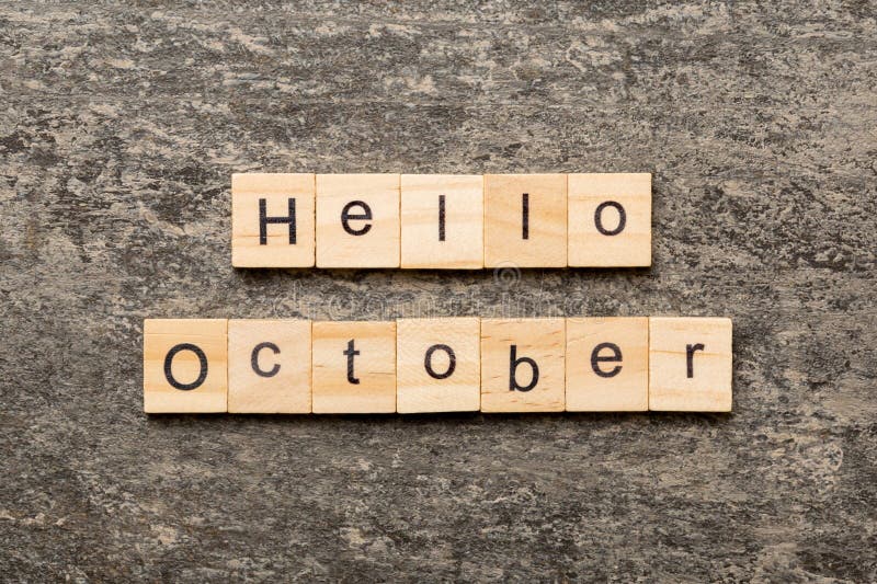 Hello October Word Written on Wood Block. Hello October Text on Table ...