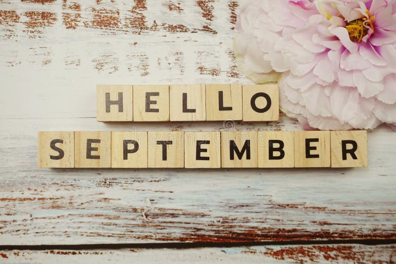 September Alphabet Letter with Maple Leaves Frame on Wooden Background ...