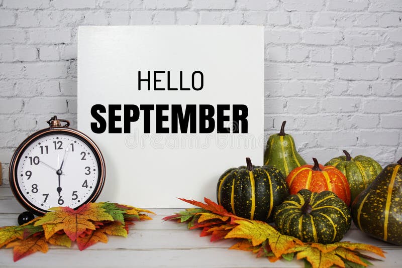 Hello September Text Message with Pumpkin and Maple Leaf Decoration on ...