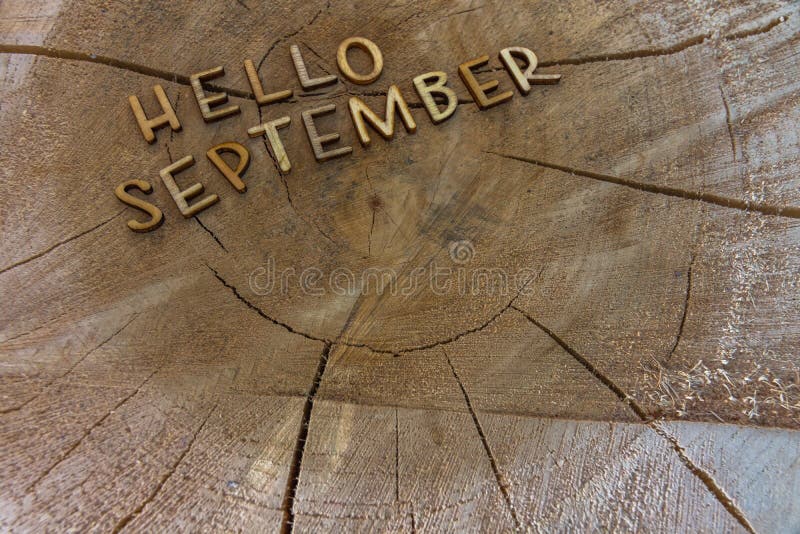 Hello September in Wooden Letters on a Tree Trunk Stock Photo - Image ...