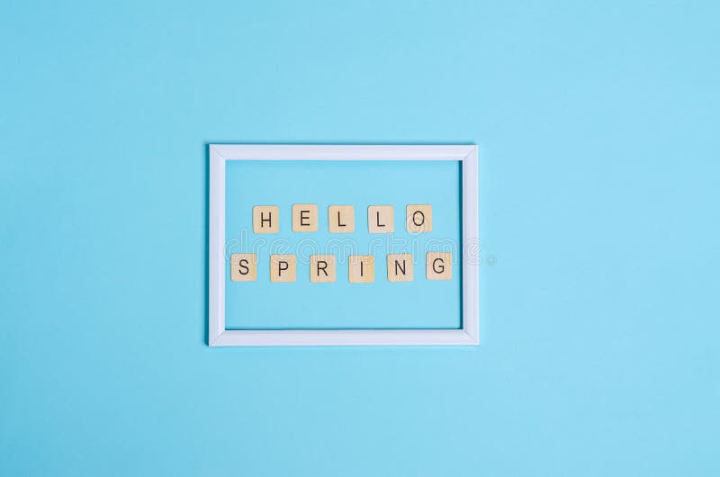 Hello Spring Text in a White Frame on a Blue Background Stock Image ...
